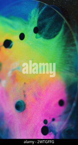 A round circle glitter blob art work of microcosmos space microbes with symmetrical dot pattern ...