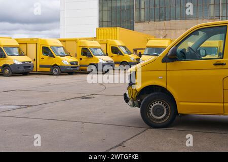 Discarded DHL vehicles that are no longer roadworthy in the yard of a ...