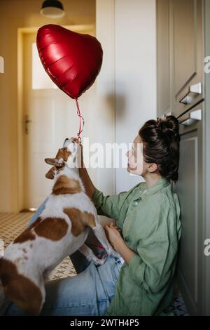 Young beautiful woman playful and enjoying with fresh air at meadows ...