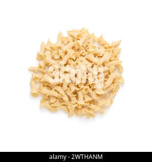 Dry Gigli or campanelle pasta on pink background. A portion of the ...