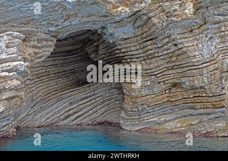 Greece, Island of Corfu, Paleokastritsa: striking folded limestone rock ...