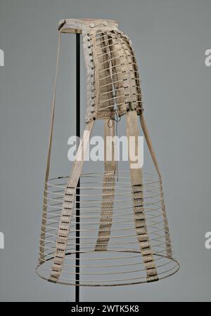 A 19th-century cage crinoline with a hoop skirt frame designed to ...