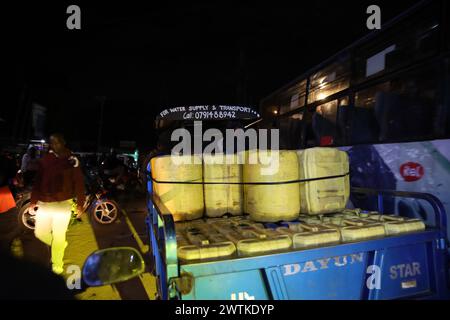 KENYA, Nairobi, Kibera slum, water hose and sewage / KENIA, Nairobi ...