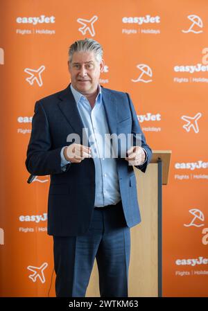EDITORIAL USE ONLY Johan Lundgren, CEO easyJet, and cabin crew at Gatwick Airport as the first ...