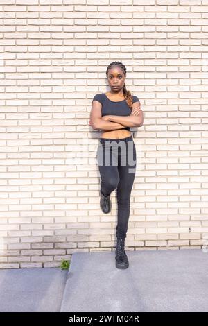 Young woman exudes strength and determination as she strikes the ...