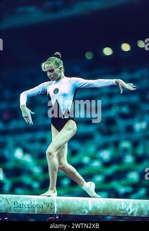 Tatiana Gutsu (EUN) competing in the women's artistic team all-around ...