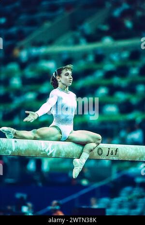 Kerri Strug (USA) competing in the women's artistic team all-around ...