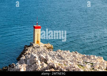 the lighthouse marks the passage through the strait Stock Photo - Alamy