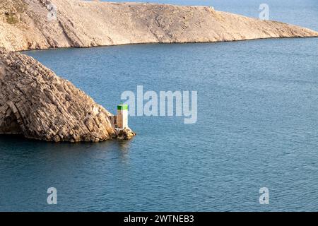 the lighthouse marks the passage through the strait Stock Photo - Alamy