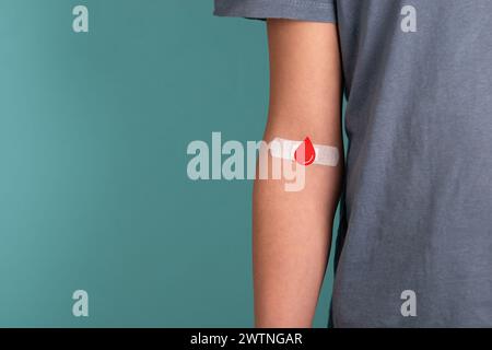 Arm with plaster, blood cells, donate plasma, world blood donor day ...