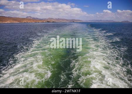 Wake in the sea Behind Big ship, prop wash of a tanker underway in open ...