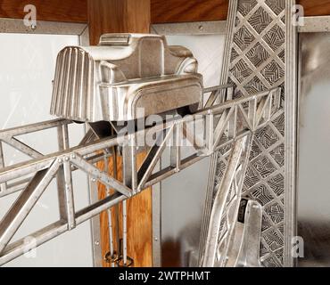 A vintage construction themed art-deco claw grabber vending machine ...