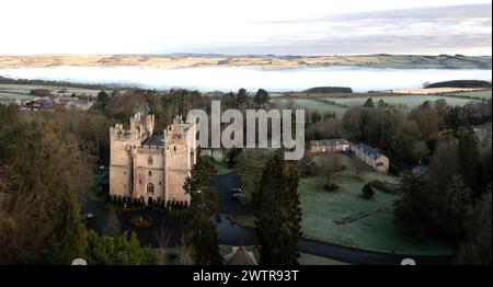 LANGLEY CASTLE, NORTHUMBERLAND, UK - MARCH 16, 2024. An aerial view of ...