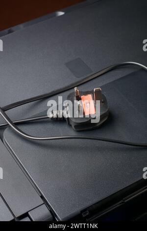 three pin ac power plug isolated on white background, british standard ...