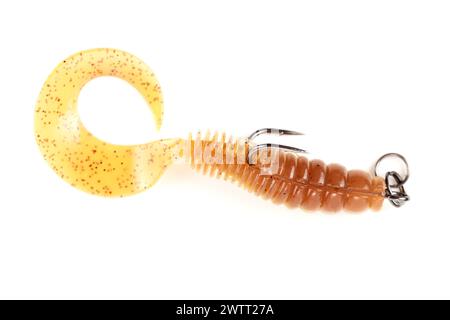 Yellow silicone grub, fishing lure with double hook, isolated on white ...