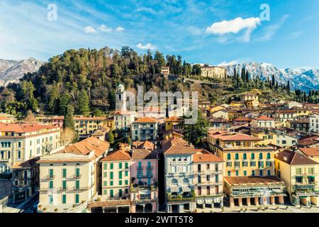 Aerial view of Bellagio village on Como lake with blue sky and the Alps ...