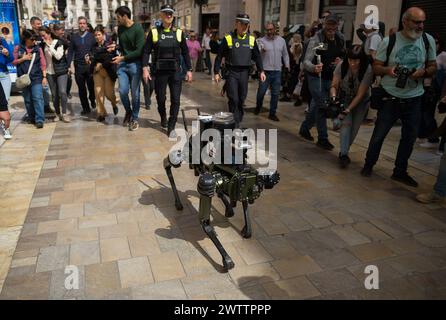 Malaga, Spain. 19th Mar, 2024. A cameraman takes a video of a robotic ...