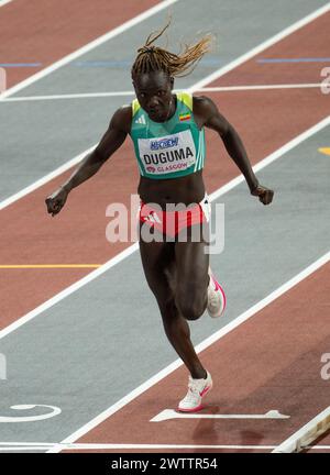 Tsige Duguma of Ethiopia crosses the finishing line to win the women’s ...
