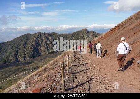 Visitors walking up the crater of the Vesuvius volcano, Naples, Italy ...
