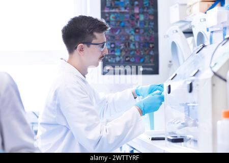 Young scientist in laboratory Stock Photo - Alamy