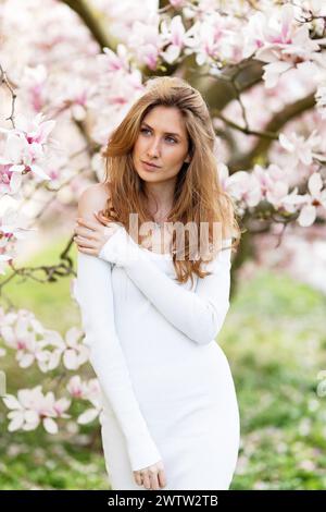 Spring blossom of white magnolia tree in sunny day with blue sky ...