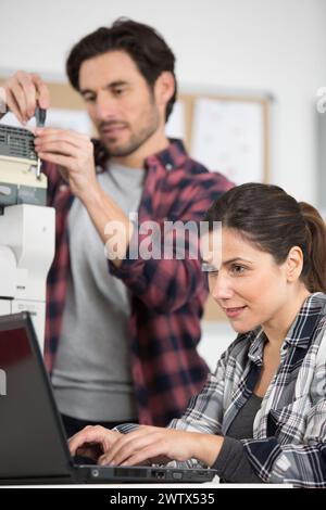 Engineer and electrician working together checking and inspecting new ...