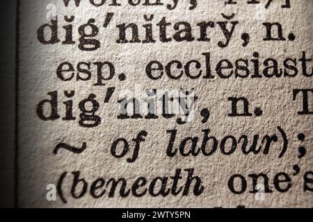 Word merit on dictionary page, macro close-up Stock Photo - Alamy