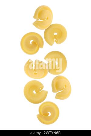 Raw dischi volanti pasta flying on white background Stock Photo - Alamy