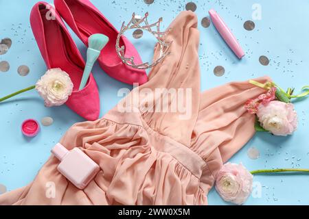 Female prom outfit with crown, perfume bottle and accessories on white ...