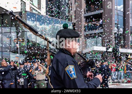 Officer with the Boston Police Gaelic Column saluting during the ...
