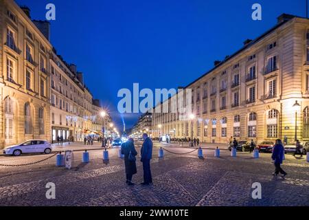 Eiffel Towers light beam visible from Pantheon square in the evening ...