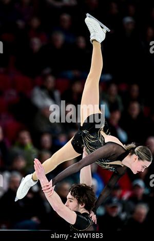 Kelly Ann Laurin and Loucas Ethier, of Canada, perform during their ...