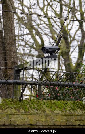 CCTV and barbed wire, London, United Kingdom Stock Photo - Alamy