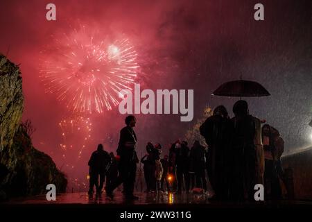 Akre, Iraq. 20th Mar, 2024. An Iraqi Kurdish man carries a fire torch ...