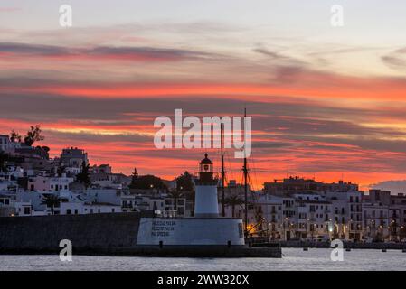 Sunset over the lighthouse in Ibiza Stock Photo - Alamy