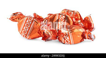 Candies in orange wrappers isolated on white Stock Photo - Alamy