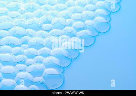 Many small soap bubbles swimmming on soft blue water surface Stock ...