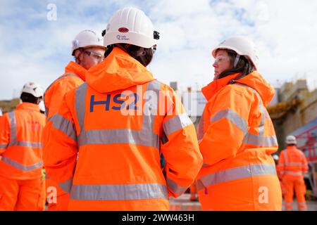 HS2 workers gather around as they await boring machine Cecelia breaking ...