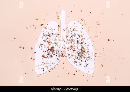 Paper lungs with tobacco on beige background. Lung cancer concept Stock ...