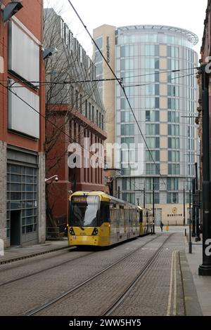 A Bee Network tram in Manchester travelling to Piccadilly. Shown here ...