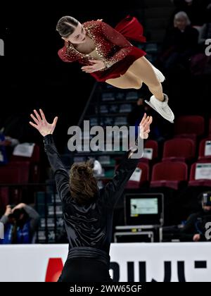 Kelly Ann LAURIN and Loucas ETHIER of Canada pose for photos after a ...