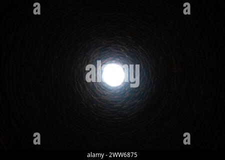Deep ancient well inside Stock Photo - Alamy
