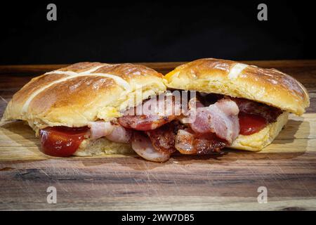 Traditional Cheesy Hot Cross Buns made into a bacon sandwich for Easter ...