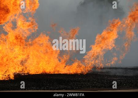 Flames from Airport Fire Training Pit (Tight), Texas Stock Photo - Alamy