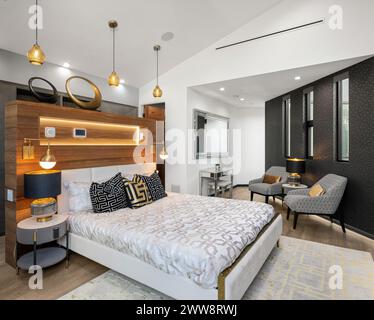 Interior of living room with electric fireplace decorated for Halloween ...