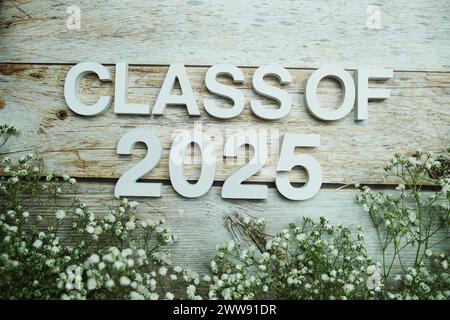Class of 2025 alphabet letter on wooden background Stock Photo - Alamy
