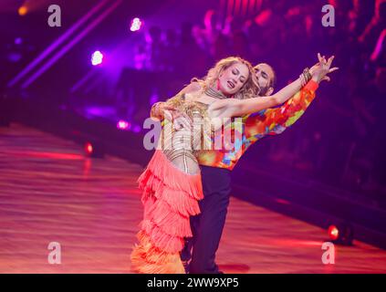 Cologne, Germany. 23rd Mar, 2024. Lulu, singer, and Massimo Sinato ...