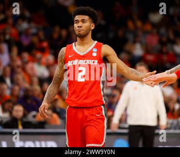 New Mexico guard Donovan Dent drives to the basket against the UNLV ...