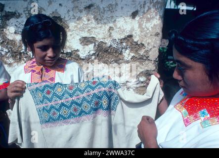 Tzotzil speaking Maya Indian woman from San Juan Chamula weaves ...