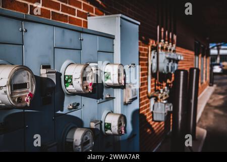 bank of electric meters outside of a strip mall Stock Photo - Alamy